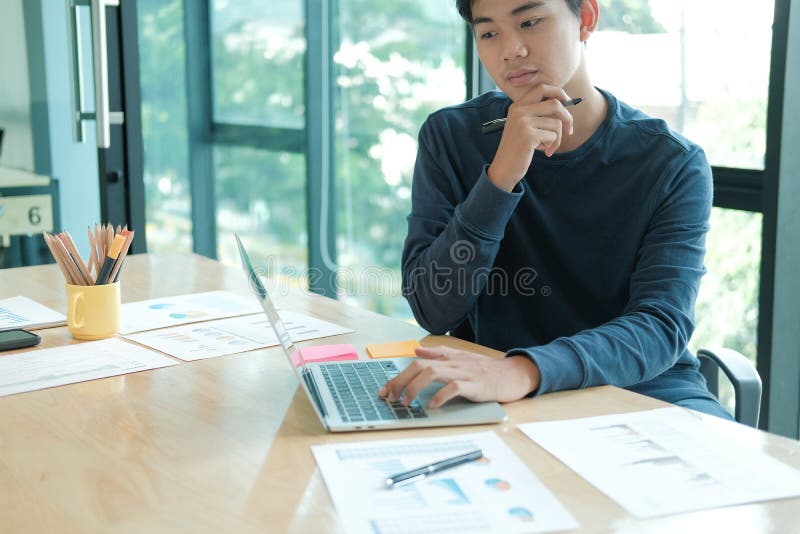 Male Freelancer Working with Computer. Startup Man Analyzing Financial ...