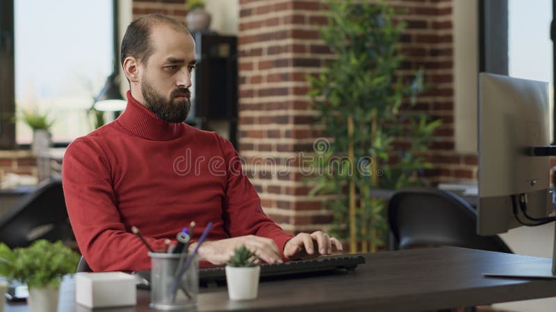 Male Freelancer Working on Financial Project with Graphs and Charts ...