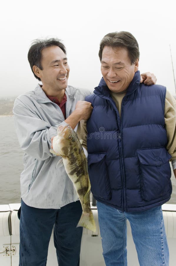 Male Friends with a Catch stock image. Image of freshness - 29648465