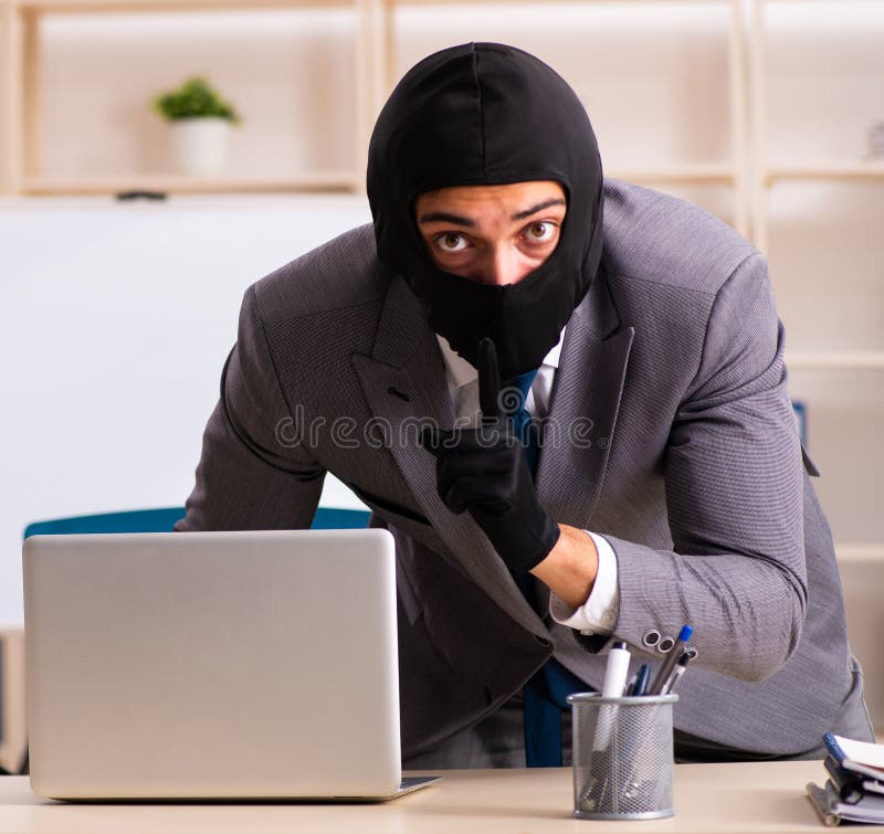 Male Gangster Stealing Information from the Office Stock Photo - Image ...