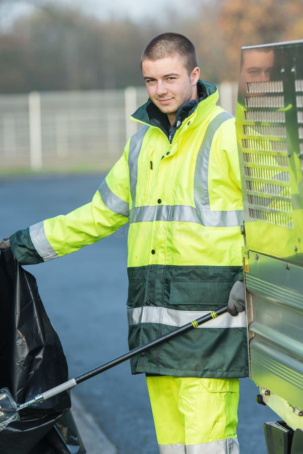 Male Garbage Collector Cleaning Streets Stock Image - Image of street ...