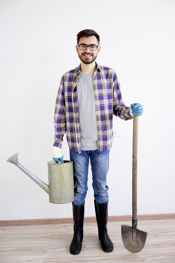Male gardener with shovel stock image. Image of american - 53436021