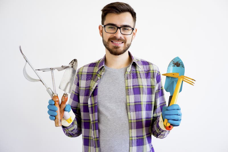 Male gardener with tools stock photo. Image of gardener - 97296886