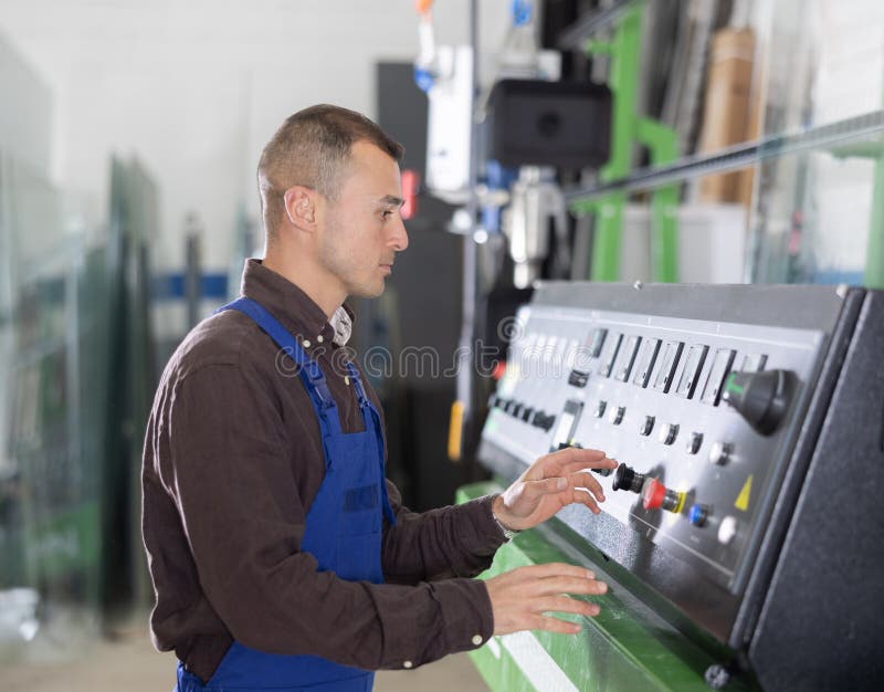 Male Glass Factory Worker at Workplace with Control Panel, Controlling ...