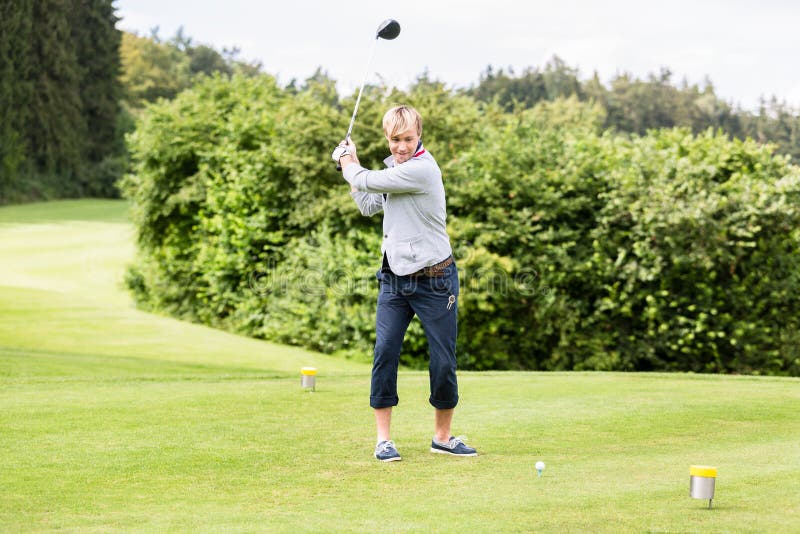 Male Golf Player Taking a Shot Stock Photo - Image of modern, grass ...