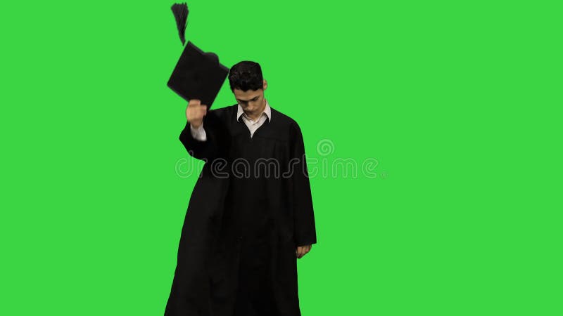 Male Graduate Walking in the Frame, Throwing His Mortarboard and Doing ...