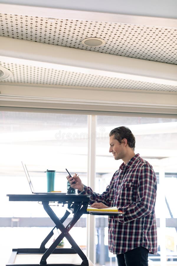 Male Graphic Designer Working on Computer at Desk Stock Image - Image ...