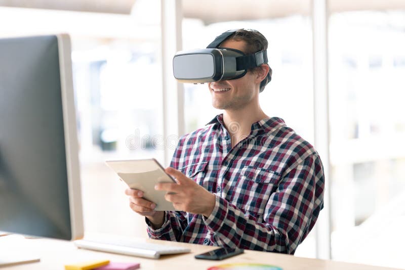 Male Graphic Designer Using Virtual Reality Headset while Working on ...