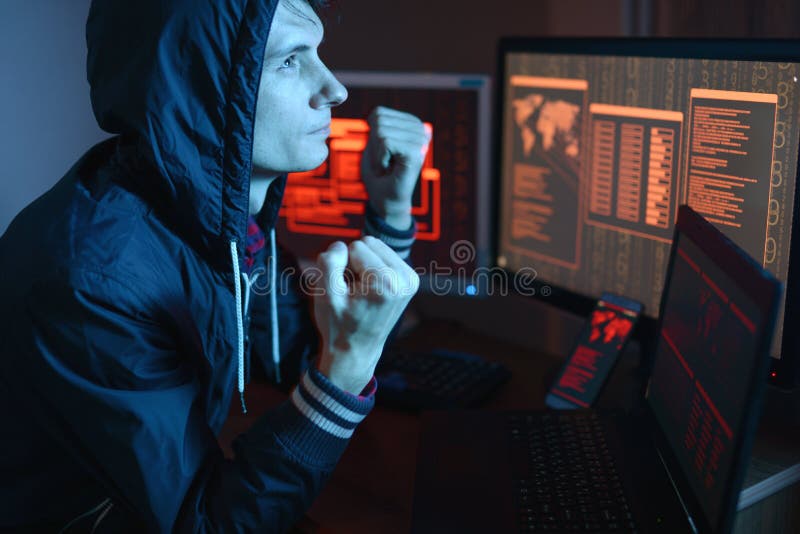 Male Hacker Celebrates Success with a Hand Gesture. a Successful ...