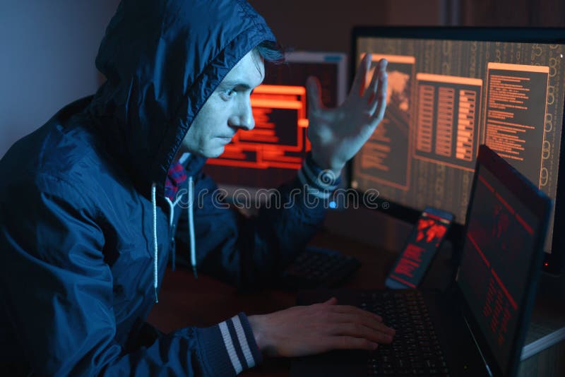 Male Hacker Celebrates Success with a Hand Gesture. a Successful ...