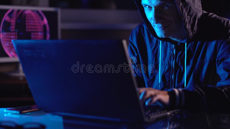 Male Hacker Celebrates Success with a Hand Gesture. a Successful ...