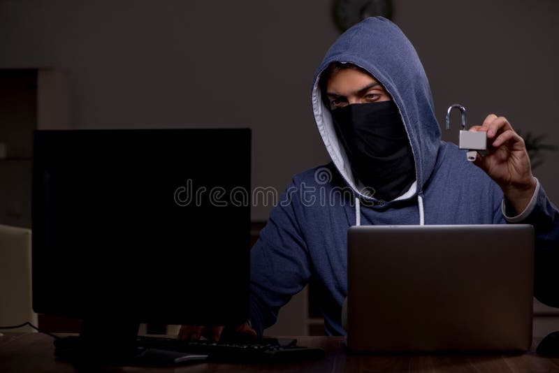 Male Hacker Hacking Security Firewall Late in Office Stock Image ...