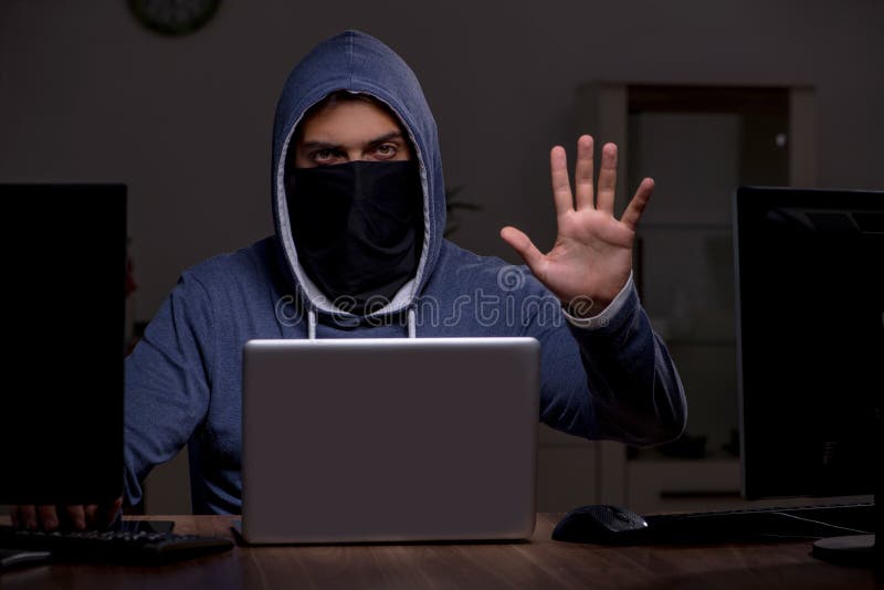 Male Hacker Hacking Security Firewall Late in Office Stock Image ...
