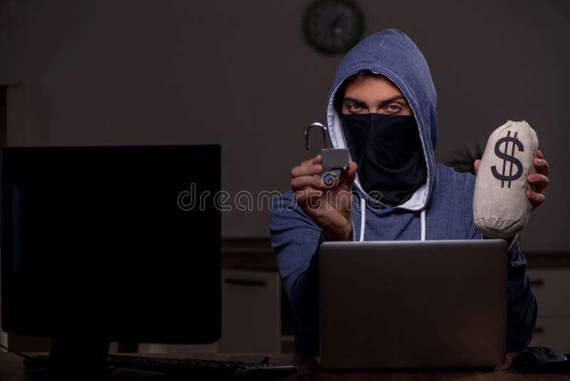 Male Hacker Hacking Security Firewall Late in Office Stock Photo ...
