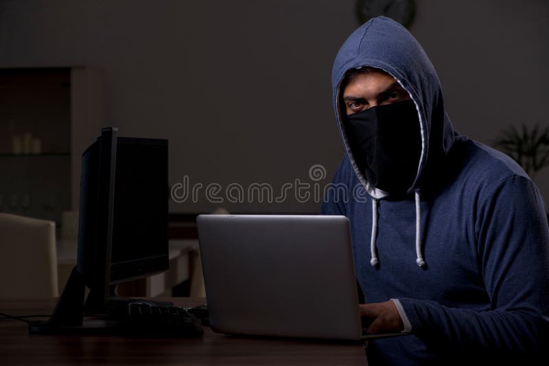 Male Hacker Hacking Security Firewall Late in Office Stock Photo ...