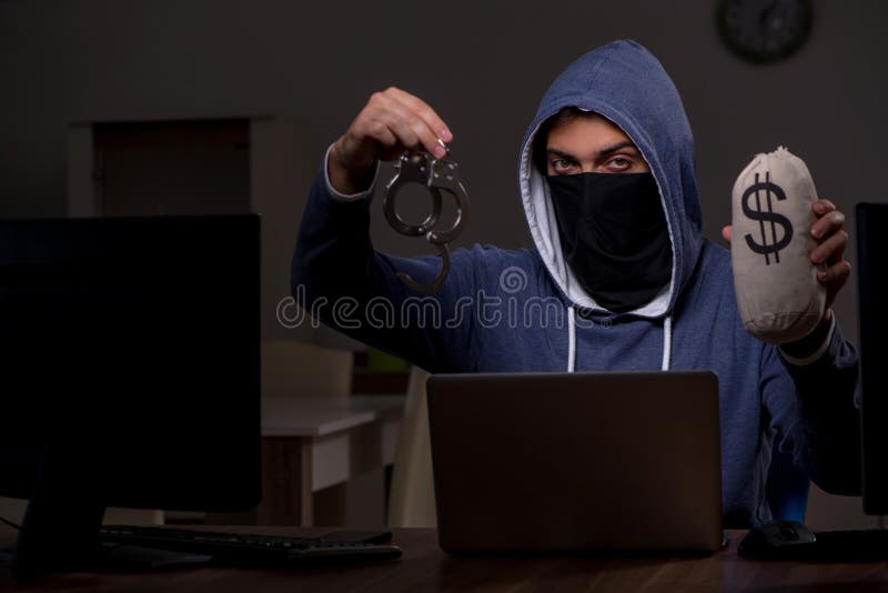 Male Hacker Hacking Security Firewall Late in Office Stock Image ...