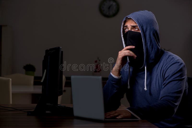 Male Hacker Hacking Security Firewall Late in Office Stock Image ...