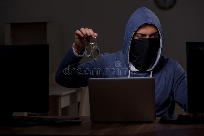 Male Hacker Hacking Security Firewall Late in Office Stock Photo ...
