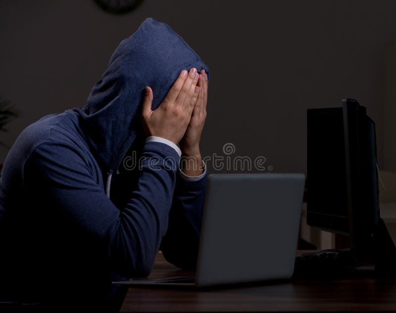 Male Hacker Hacking Security Firewall Late in Office Stock Image ...