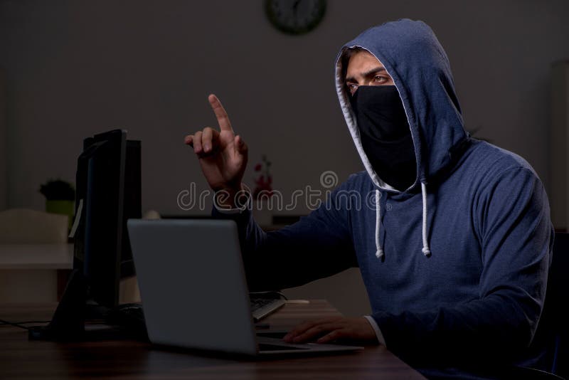 Male Hacker Hacking Security Firewall Late in Office Stock Image ...
