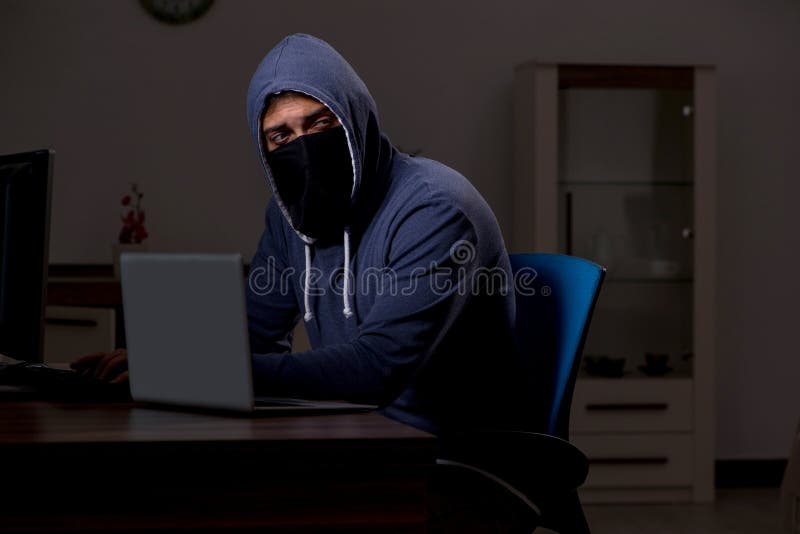 Male Hacker Hacking Security Firewall Late in Office Stock Photo ...