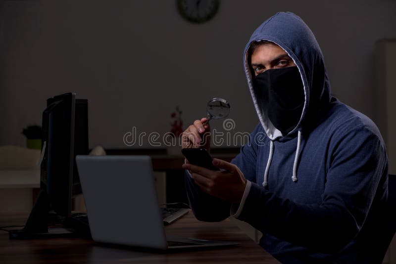 Male Hacker Hacking Security Firewall Late in Office Stock Photo ...