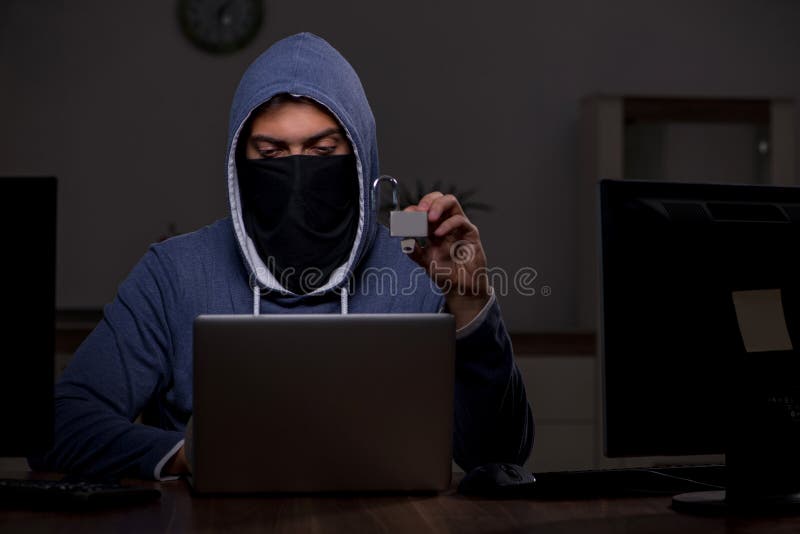 Male Hacker Hacking Security Firewall Late in Office Stock Image ...