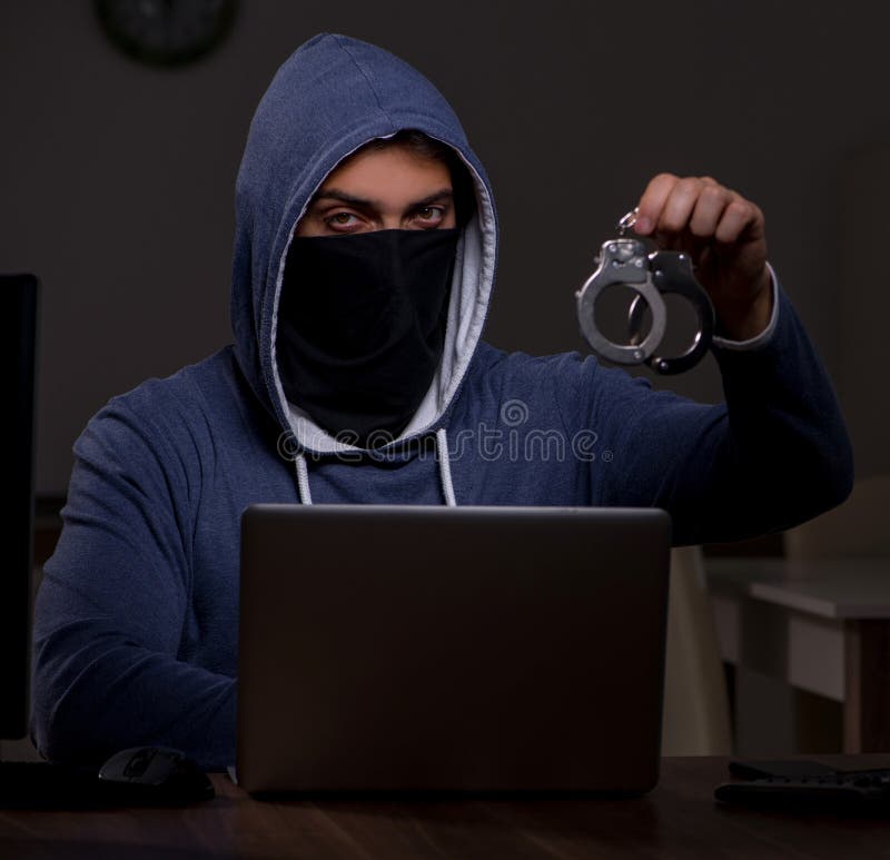 Male Hacker Hacking Security Firewall Late in Office Stock Photo ...