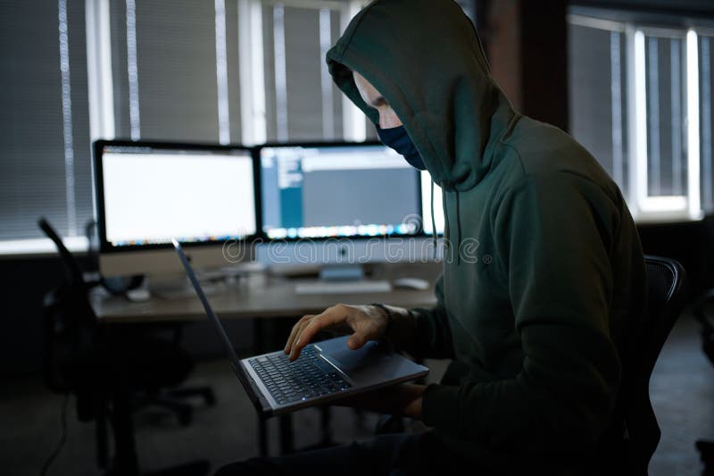 Male Hacker in Hood Holds Laptop, Front View Stock Image - Image of ...