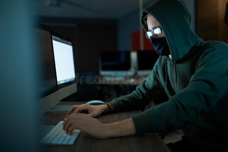Male Hacker in Hood Holds Laptop, Front View Stock Photo - Image of ...
