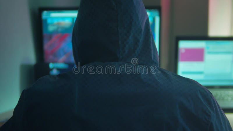 Male Hacker Internet Working on a Computer. Man Hacker Indoor in Hood ...