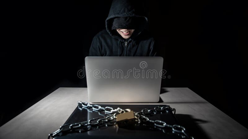 Hacker with Locked Laptop Computer. Cyber Attack Concept Stock Photo ...