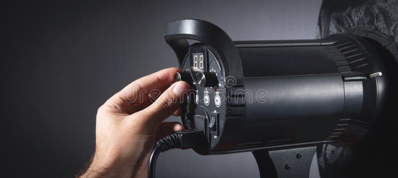 Male Hand Adjusts Flash in Studio Stock Image - Image of black, light ...