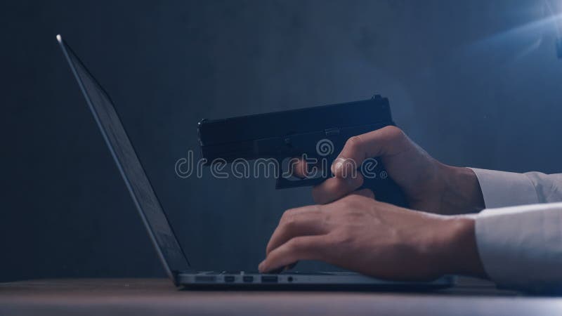 Male Hand Aims the Gun at the Computer Screen. Concept of Cyber Robbery ...