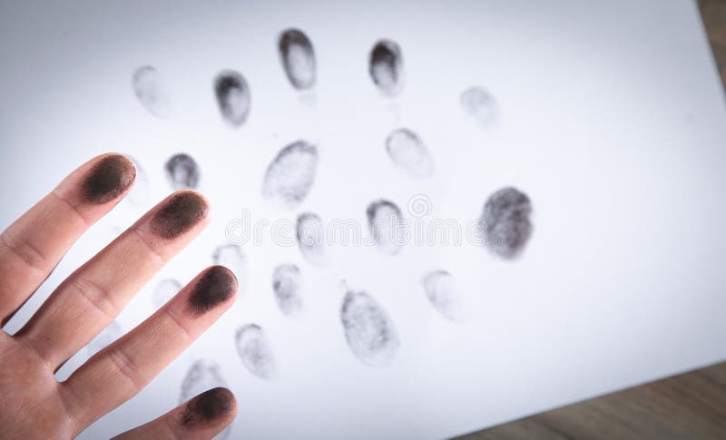 Male Hand with a Black Print of Fingers on Paper Stock Image - Image of ...