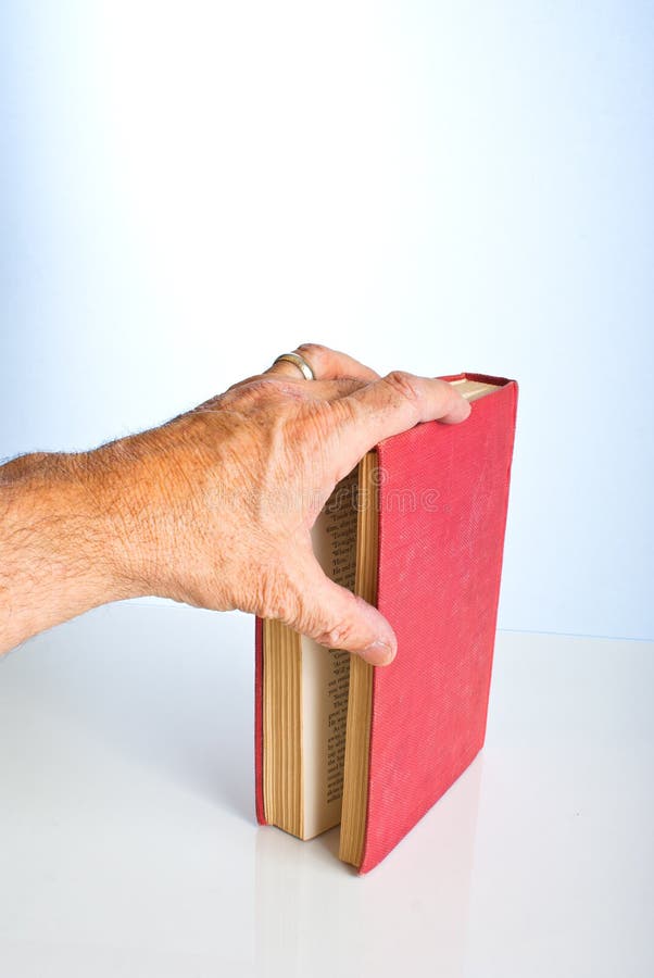 Male hand with book stock image. Image of showing, reading - 17747621