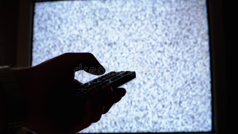 A Man Changes the TV Channels Using the Remote Control. Stock Video ...