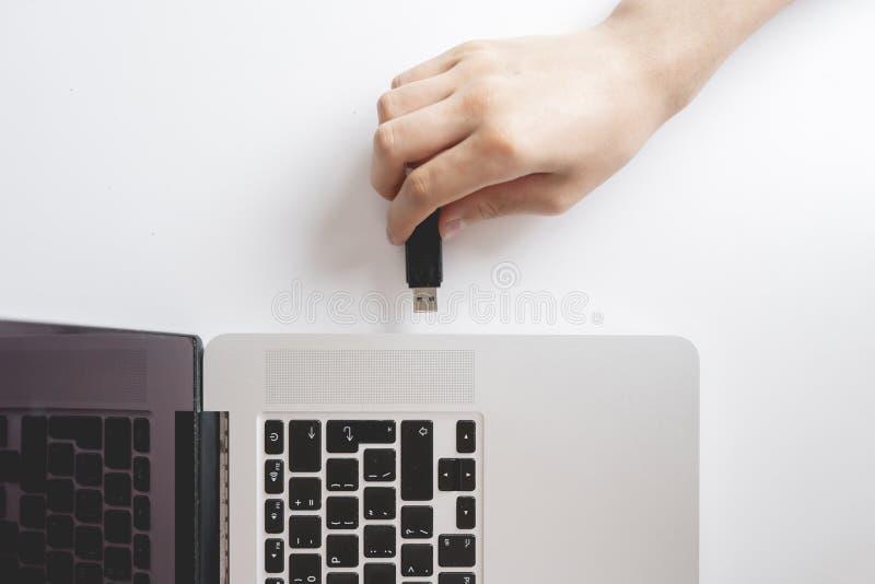 Male Hand Connect Usb Flash Drive in a Laptop Device B Stock Image ...