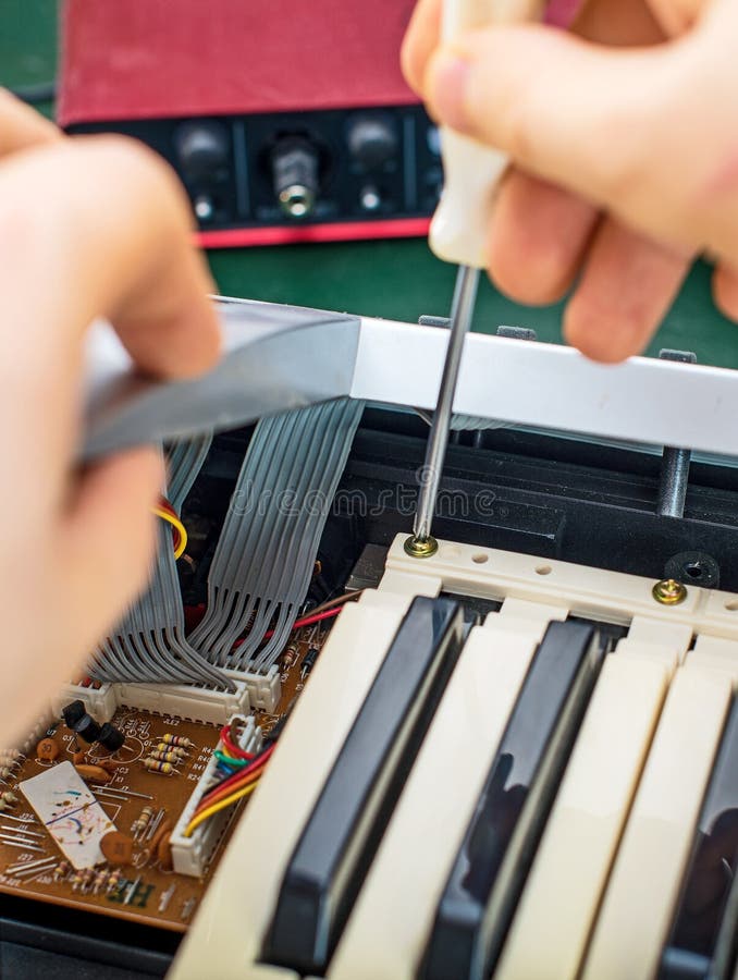 Male Hand Fixing Midi Keyboard. Stock Image - Image of broken, audio ...