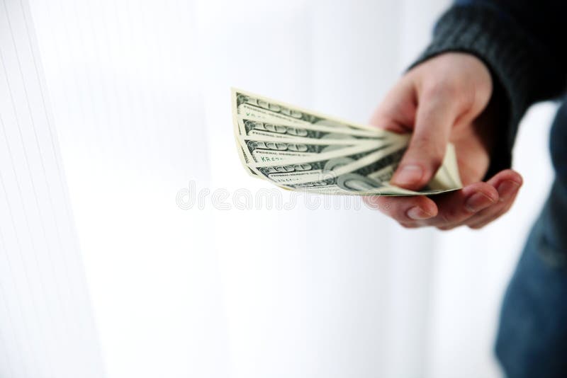 Hands Clutching American Money Stock Photo - Image of finance, arms ...