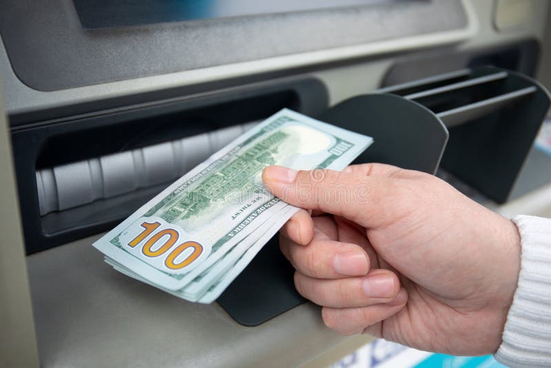 Male Hand Hold Money Dollars Received from an ATM Stock Image - Image ...