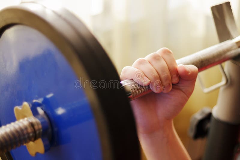 Male Hand Holding a Barbell Stock Image - Image of body, activity: 94177069