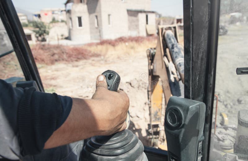 Male Hand Holding a Control Joystick. Work in Excavator Stock Photo ...