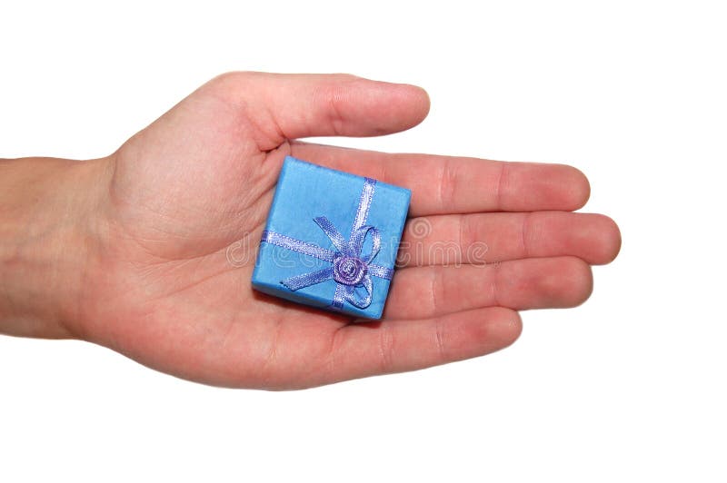 Male hand holding gift box stock image. Image of violet - 8038843