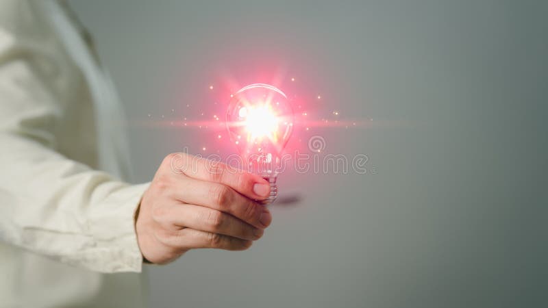 Male Hand Holding Light Bulb Creative Lighting with Glowing Light Bulb ...