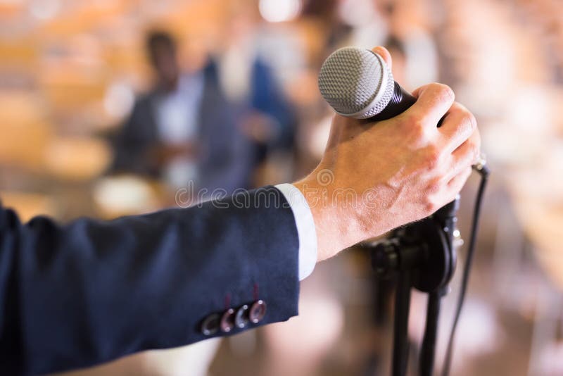 Male Hand Holding Microphone at Conference Hall Stock Image - Image of ...