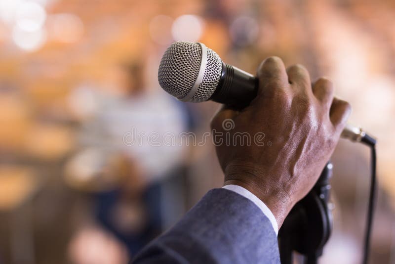 Male Hand Holding Microphone at Conference Hall Stock Image - Image of ...