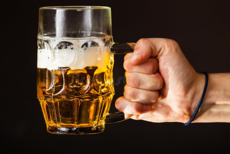 Male Hand Holding Mug of Beer Stock Photo - Image of liquid, full: 43784884 Male Hand Holding Mug of Beer Stock Photo - Image of liquid, full: 43784884
