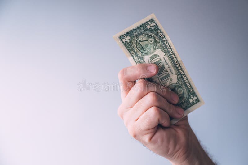 Male Hand Holding One Dollar Bill, Man with USA Currency Banknote Stock ...