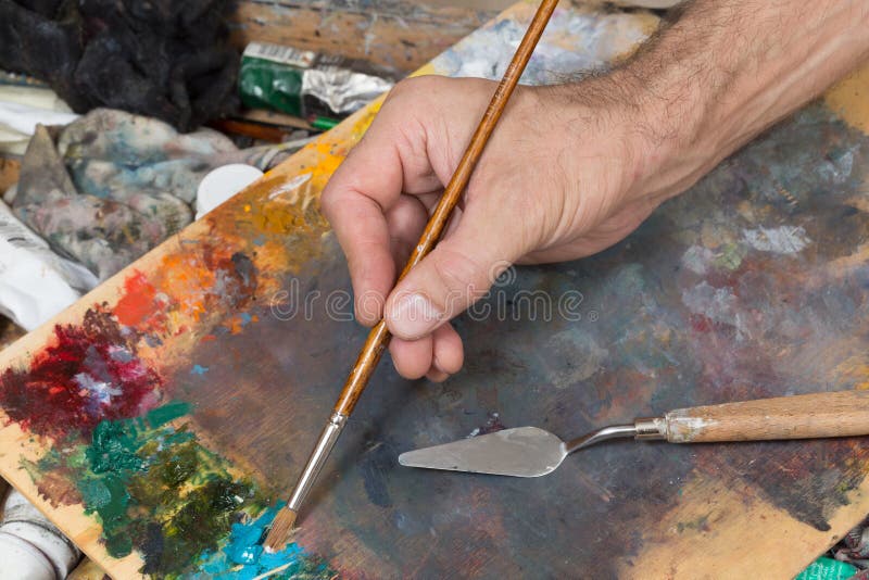 Male Hand Holding Paint Brush Stock Image - Image of hand, creativity ...